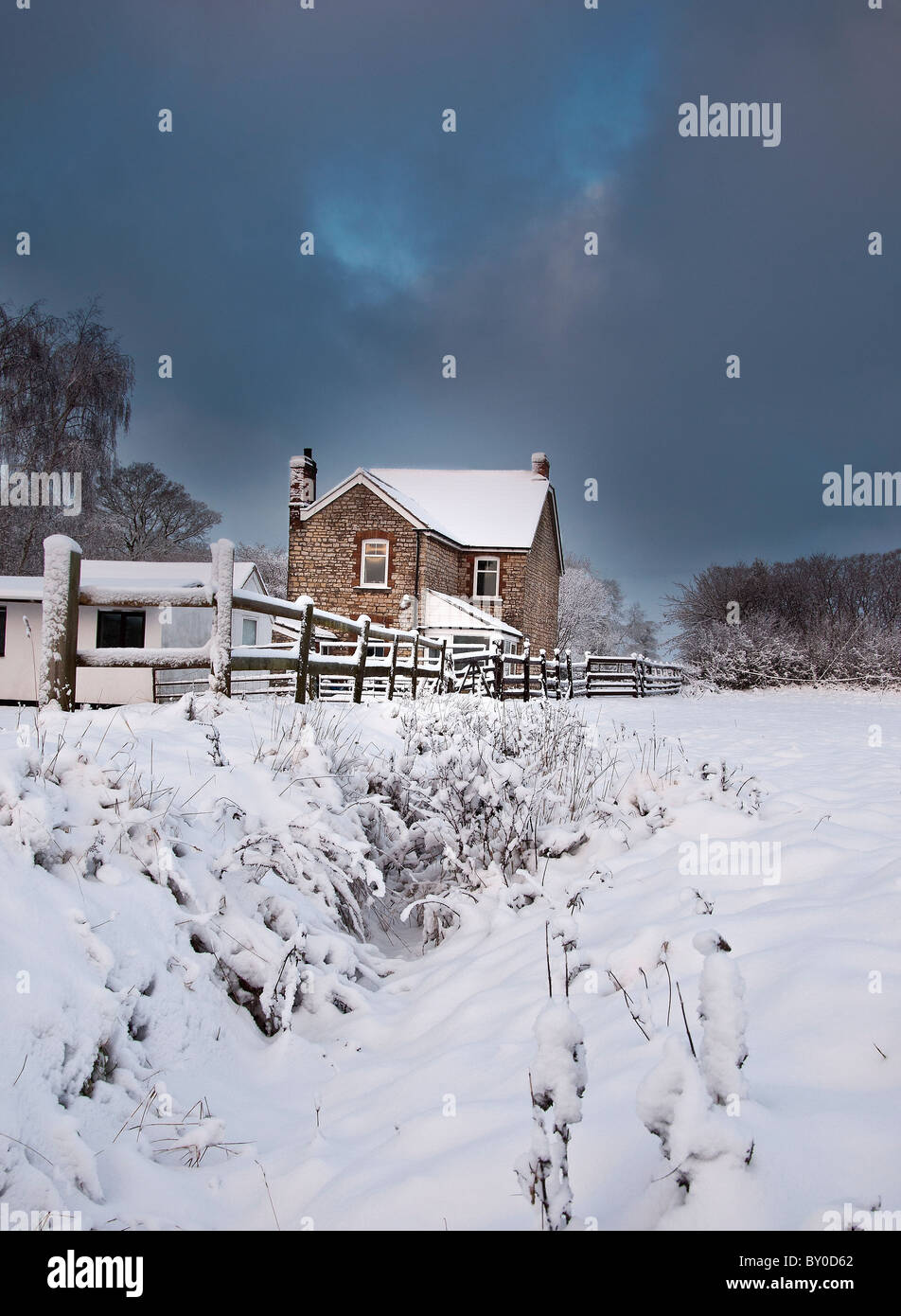 Snow covered farm house Stock Photo - Alamy