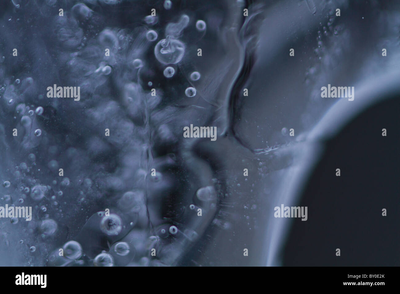 Macro of ice bubbles and ridges formed in an icicle Stock Photo - Alamy