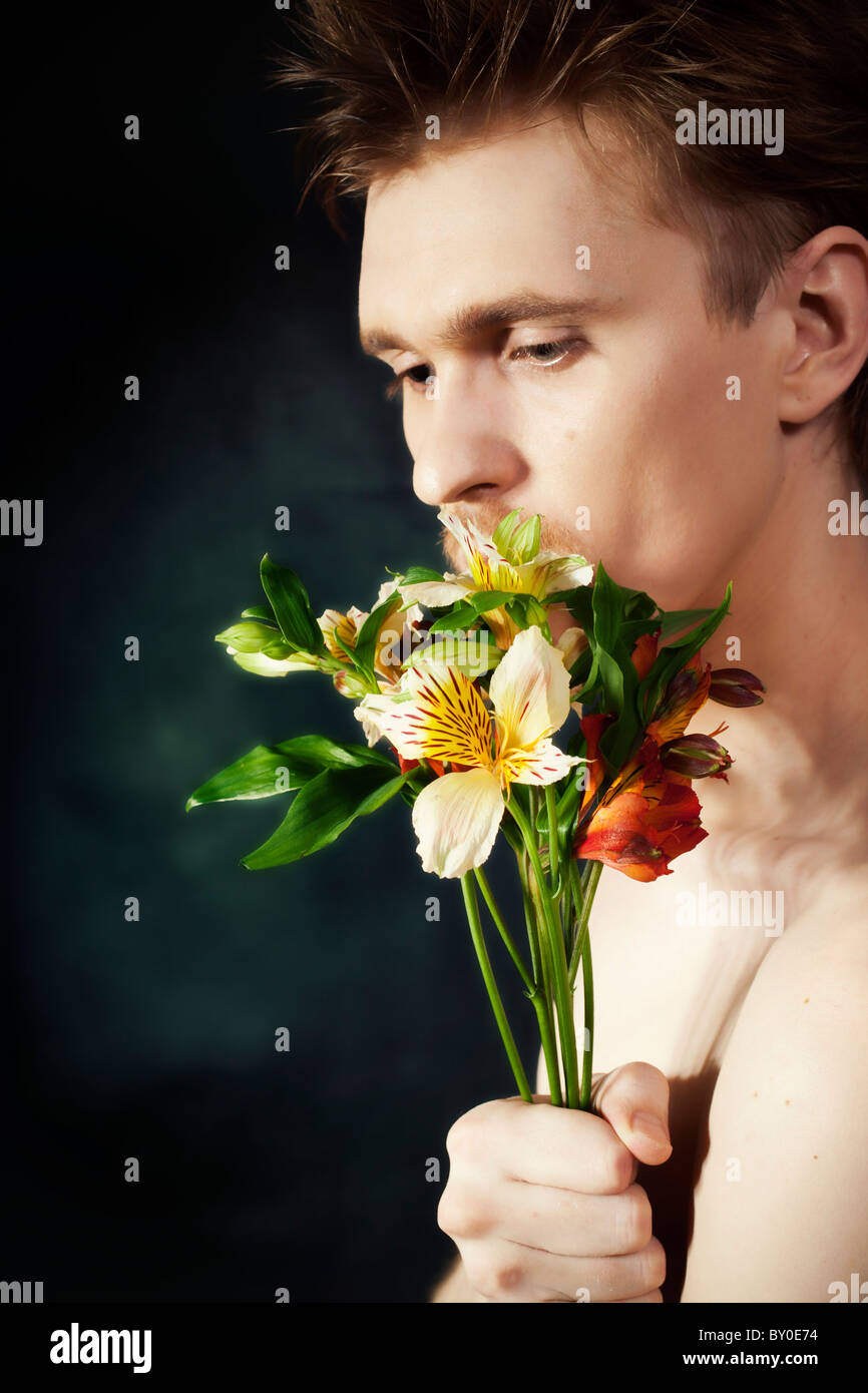 Young black male sniffing hi-res stock photography and images - Alamy