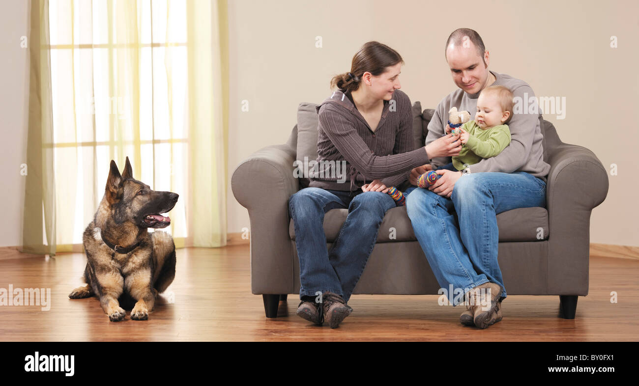 family with German Shepherd dog Stock Photo - Alamy