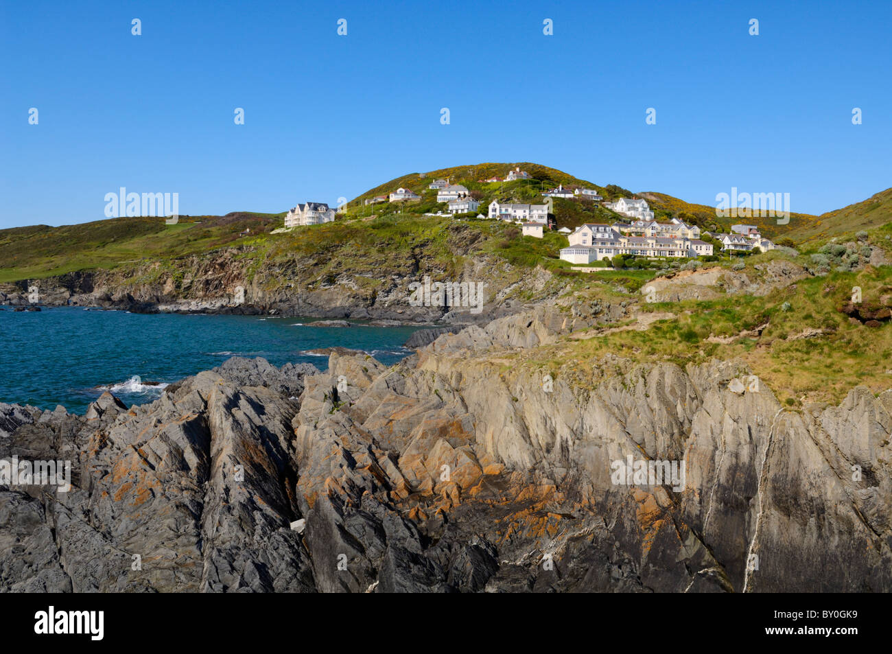 Mortehoe village viewed from the rocks at Barricane Beach. Devon ...