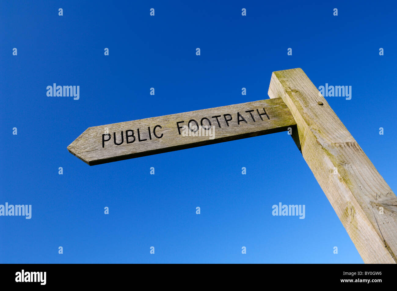 Public Footpath sign under a clear blue sky at Woolacombe, Devon ...