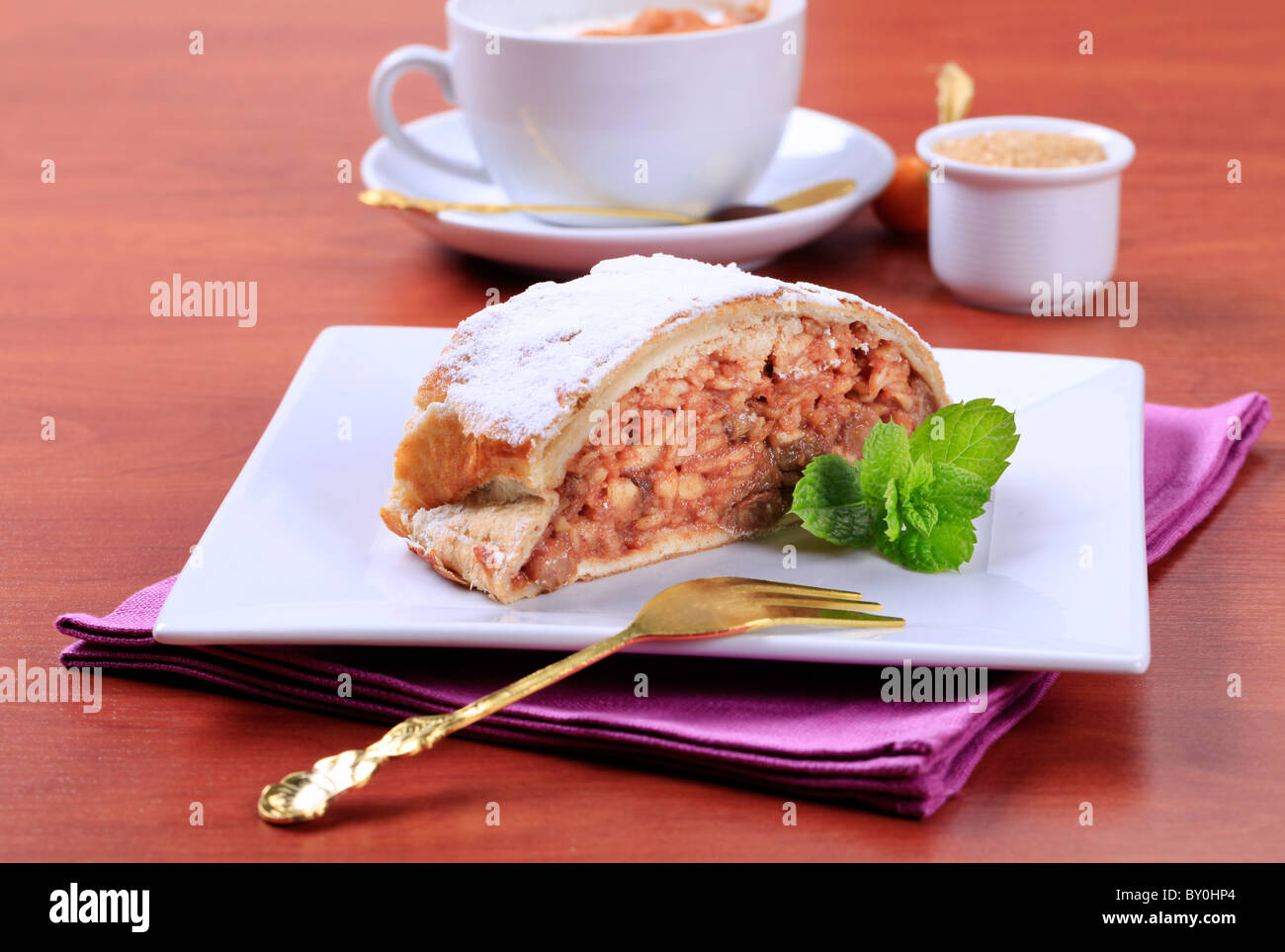 Slice of apple strudel and a cup of coffee Stock Photo - Alamy