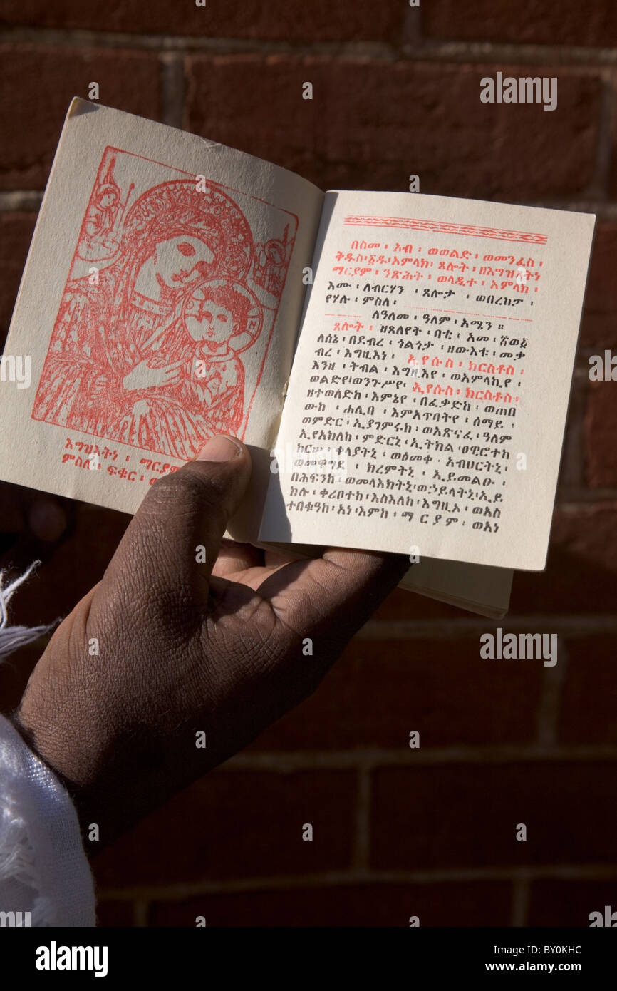 Ethiopian Worshipper Holding An Open Prayer Book Stock Photo - Alamy