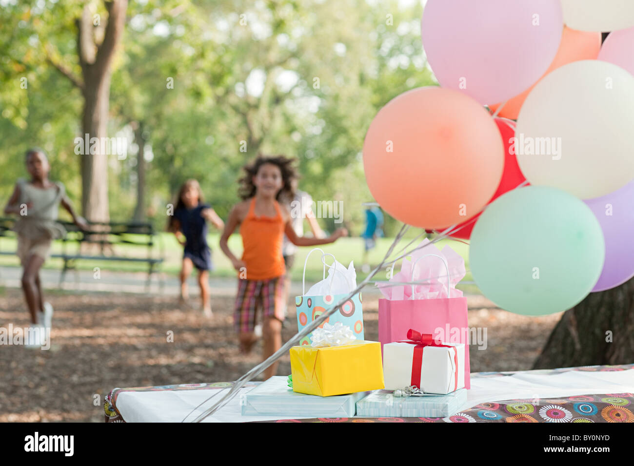 Outdoor birthday party with balloons Stock Photo - Alamy