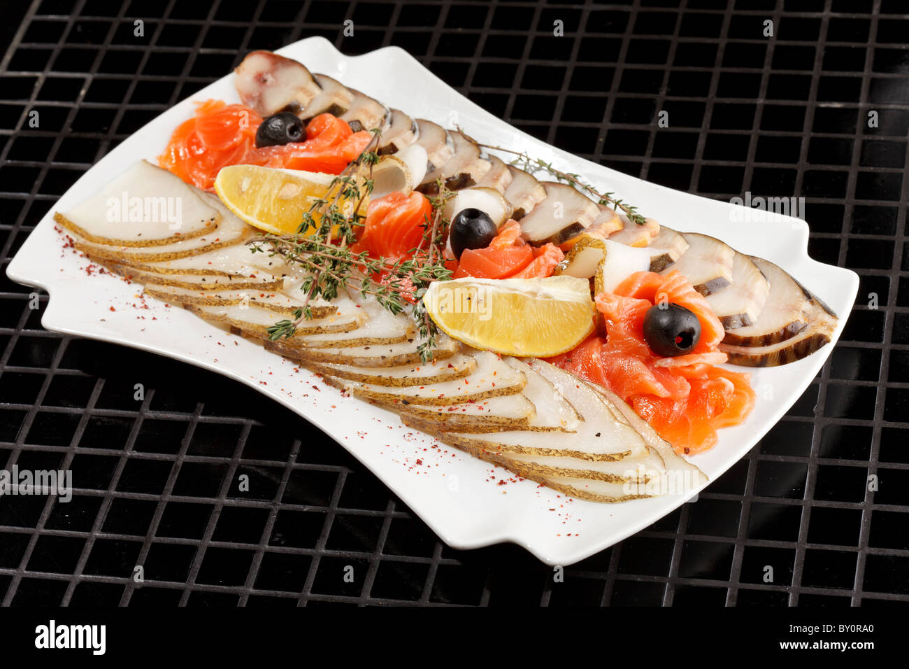 Fish delicacies on a festive table Stock Photo - Alamy