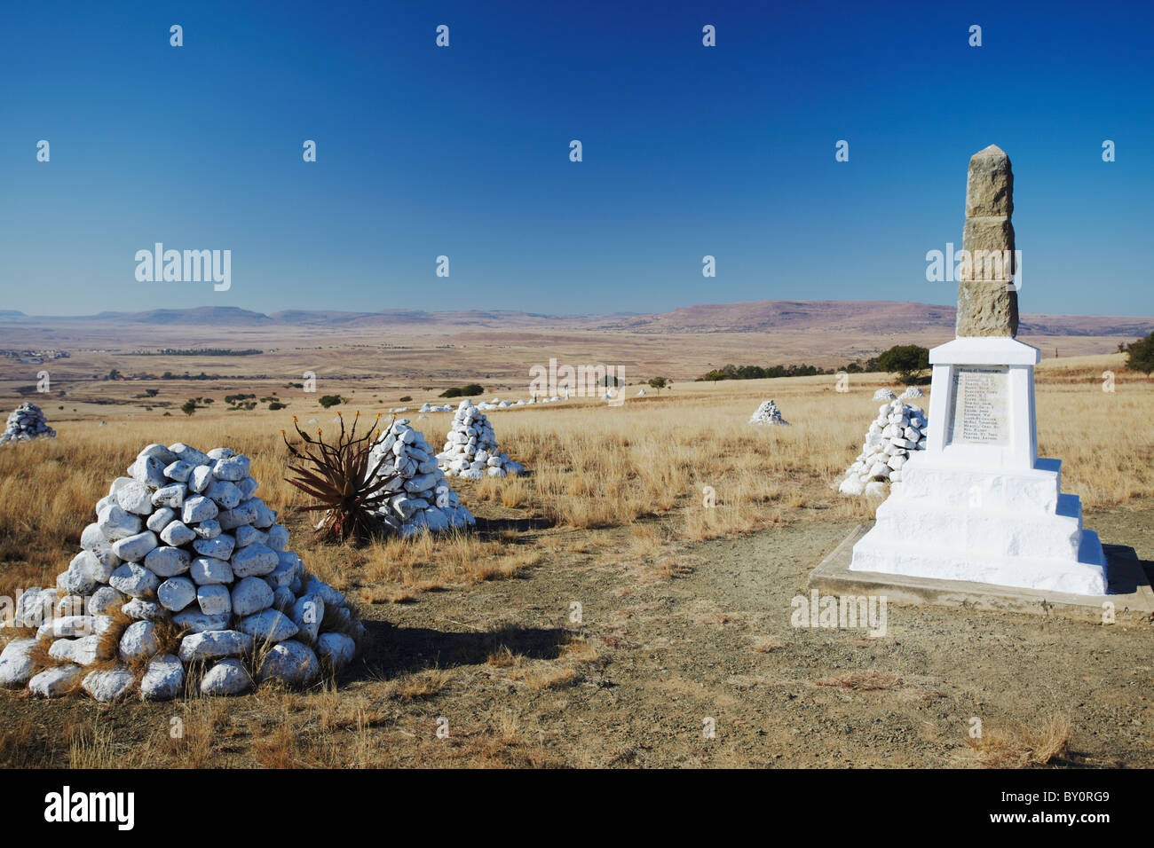 White stone cairns and memorials to British soldiers at Isandlwana ...