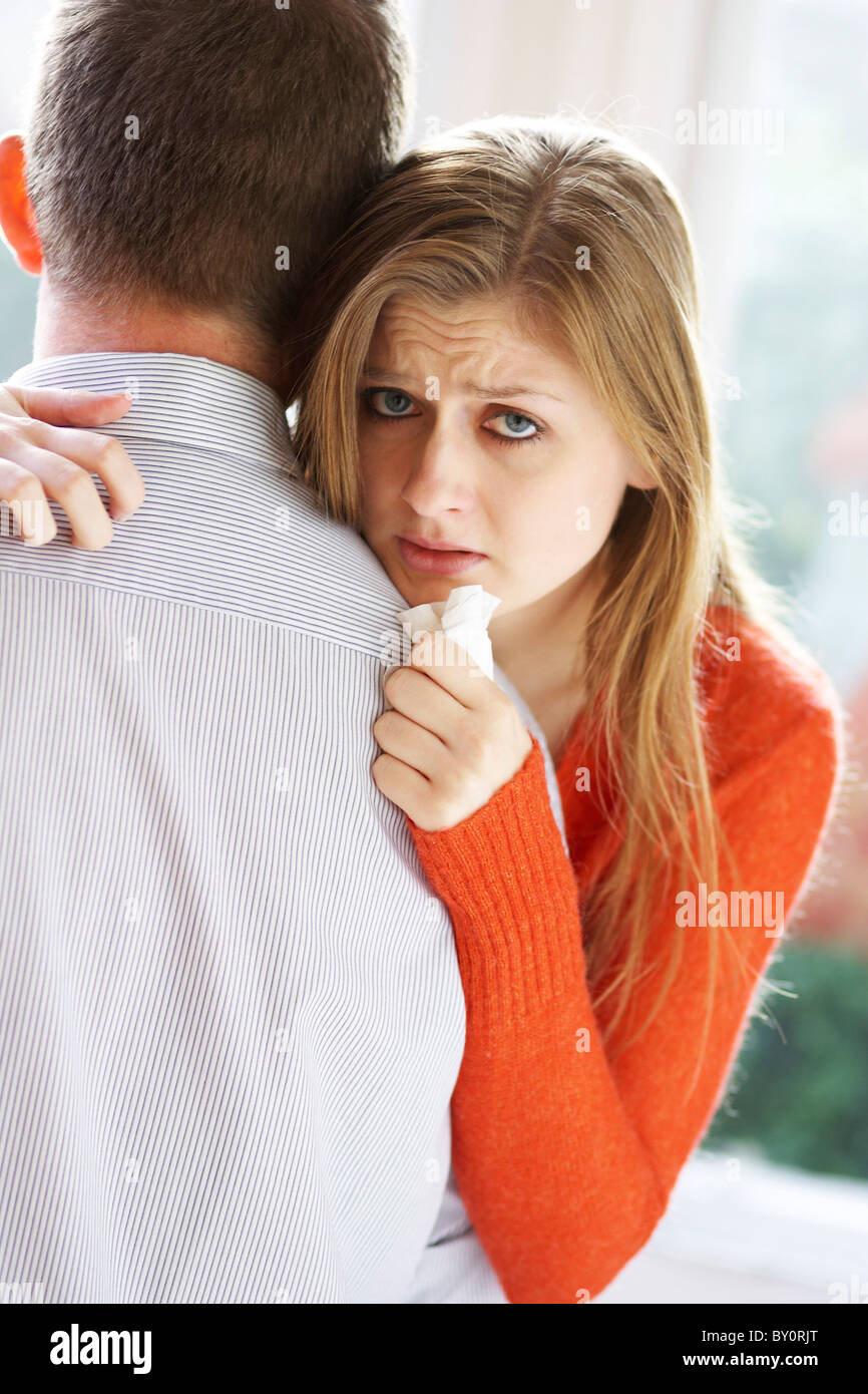 Woman hugging father sad hi-res stock photography and images - Alamy