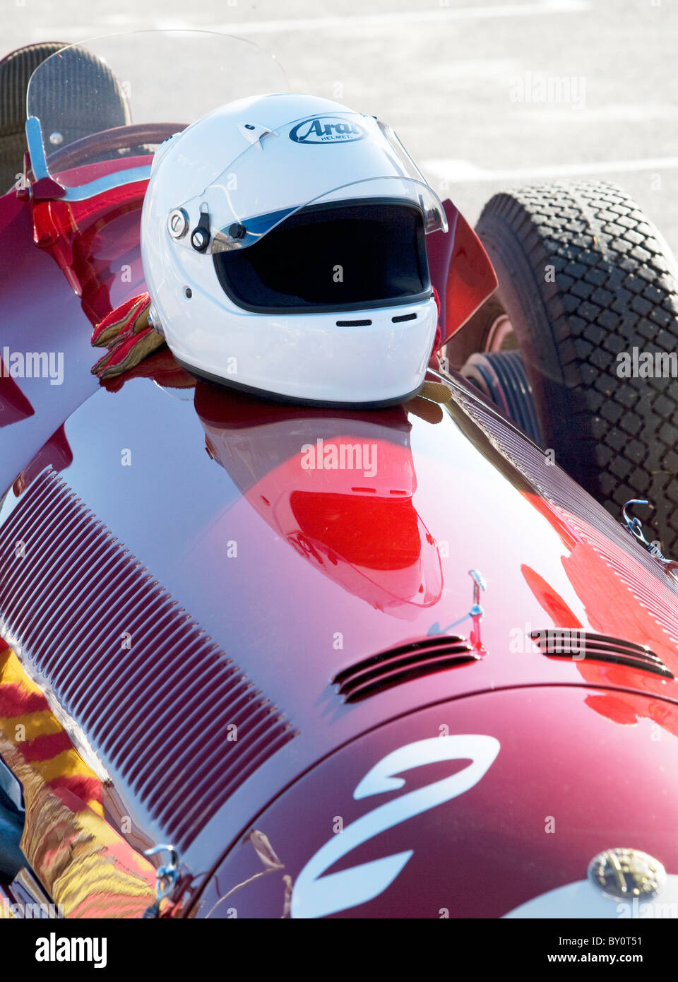 White Helmet on Red Race Car Stock Photo - Alamy