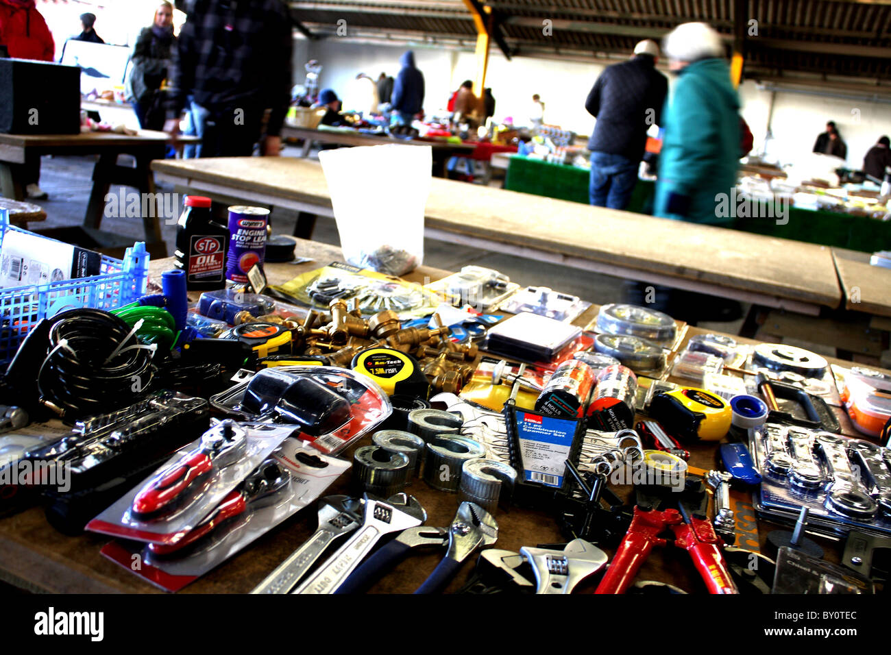 A table top and stalls car boot sale with house clearance goods, used ...