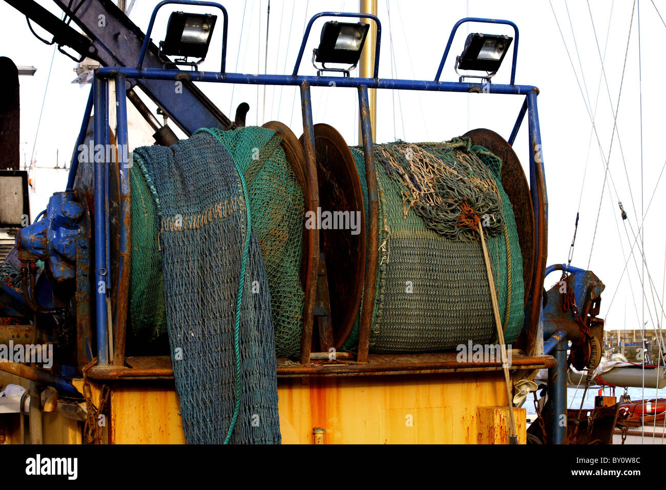 Trawler fishing nets on a fishing boat ready to go out to sea Stock ...