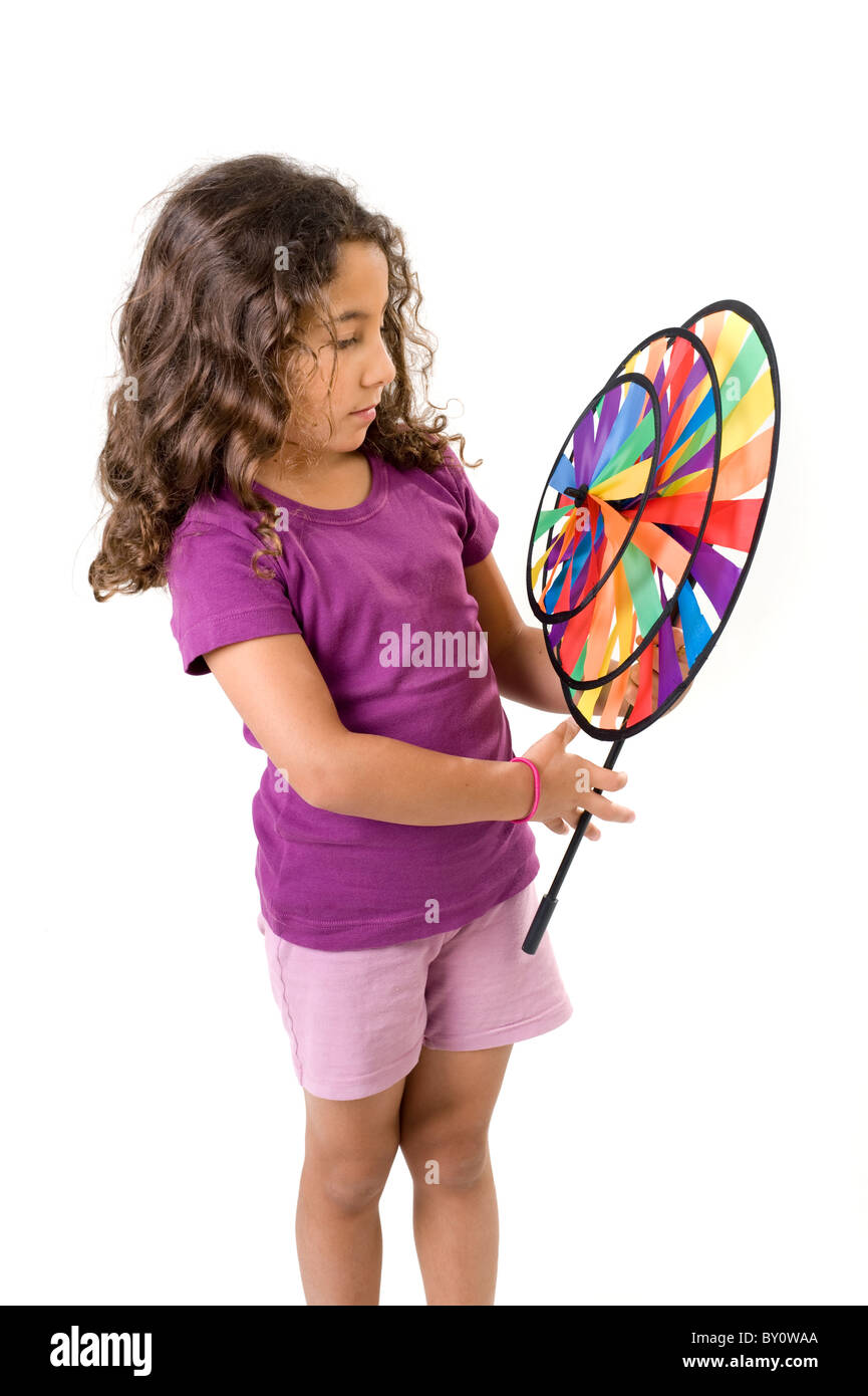 Girl with a pinwheel hi-res stock photography and images - Alamy