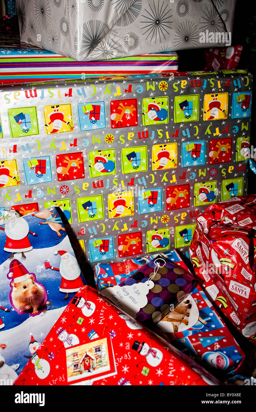 A large selection of colourful individually wrapped Christmas presents ...