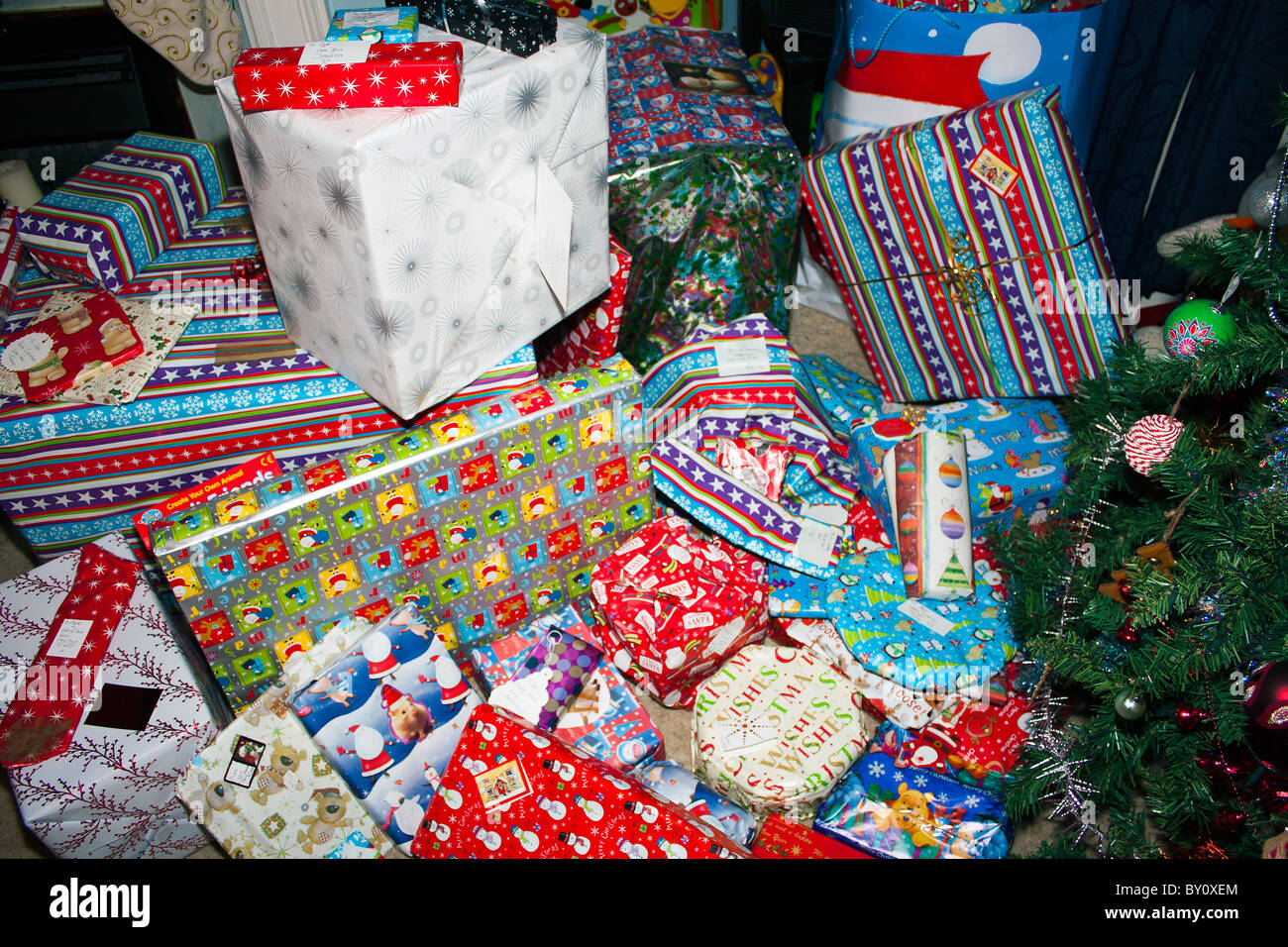 A large selection of colourful individually wrapped Christmas presents ...