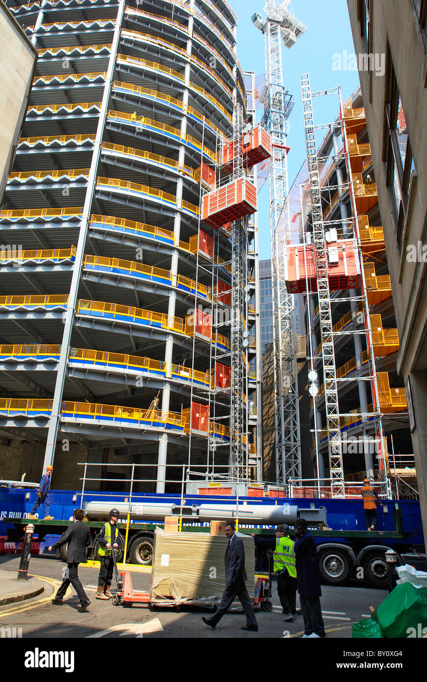 Steel frame construction. A lift platform is visible on the side of the ...