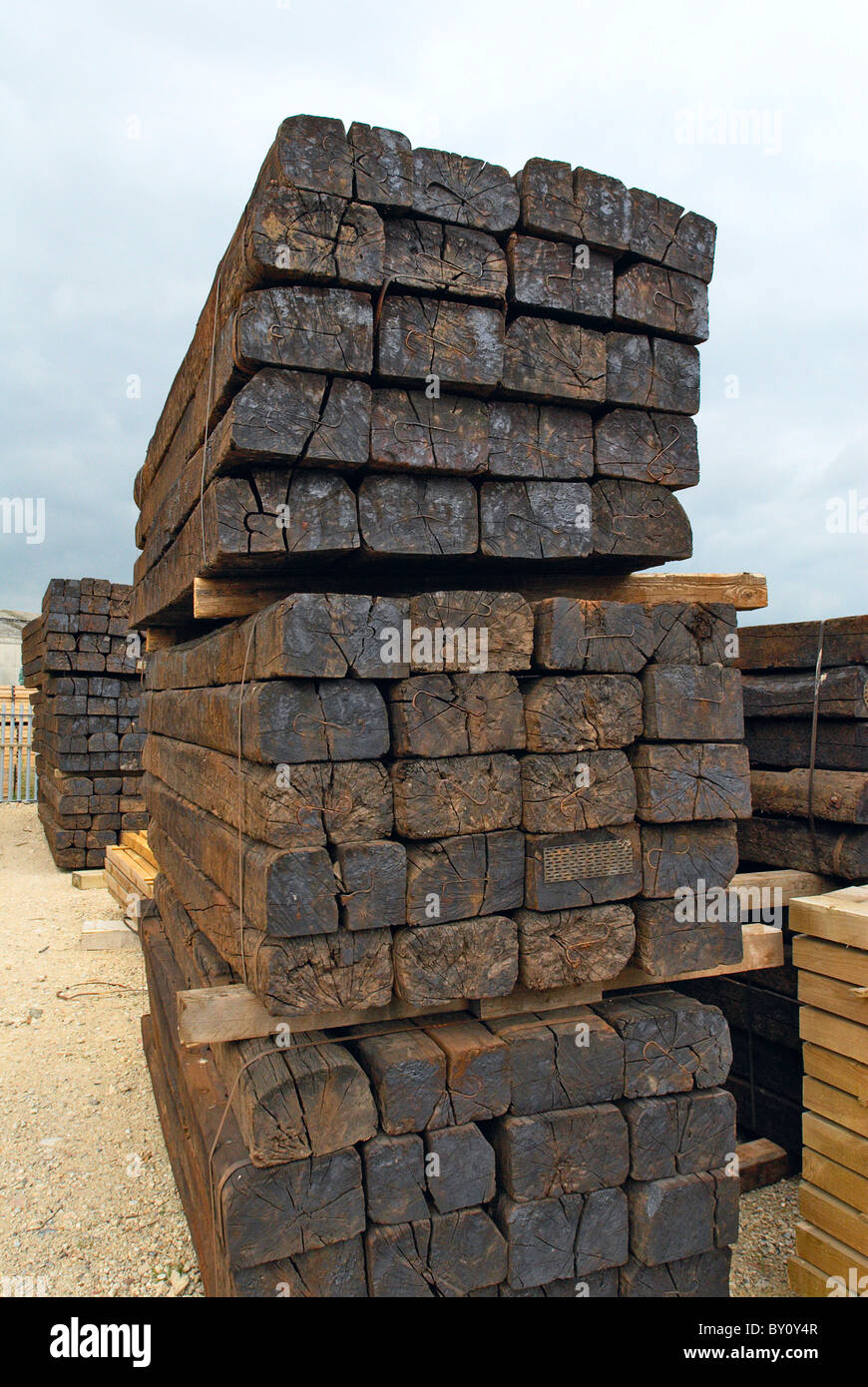 Stack of railway sleepers Stock Photo - Alamy