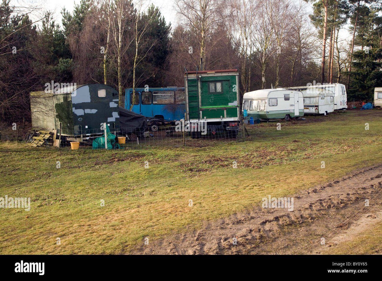 Travellers' site caravans vans Sutton Heath Suffolk England Stock Photo ...