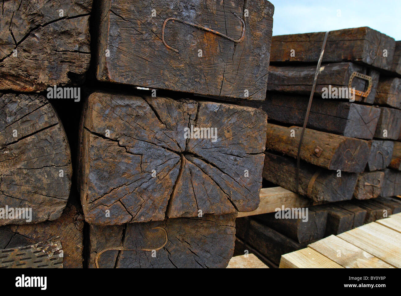 Stack of railway sleepers Stock Photo - Alamy