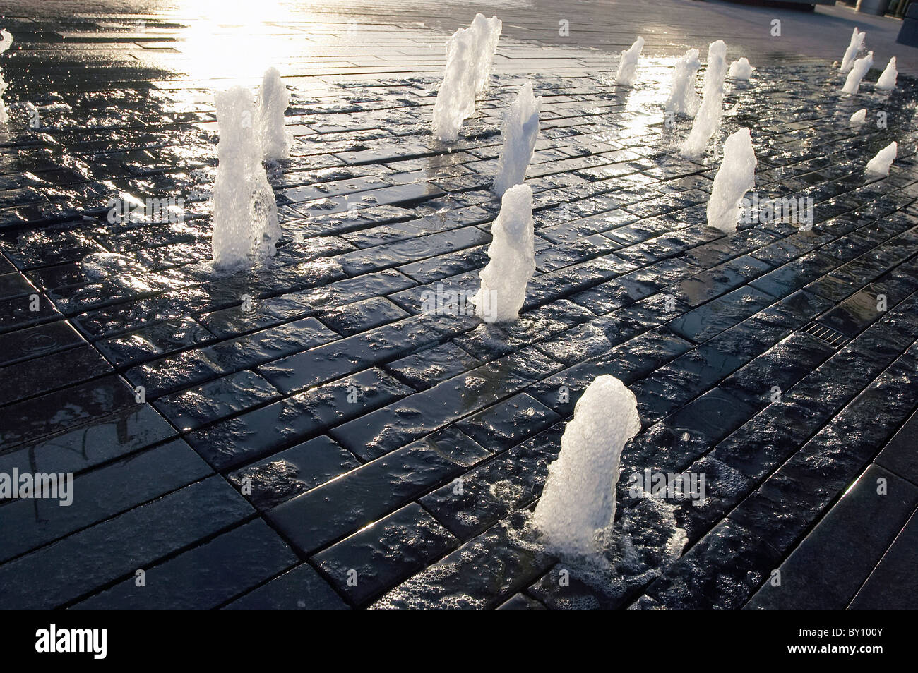 Water feature with paving stones Stock Photo - Alamy