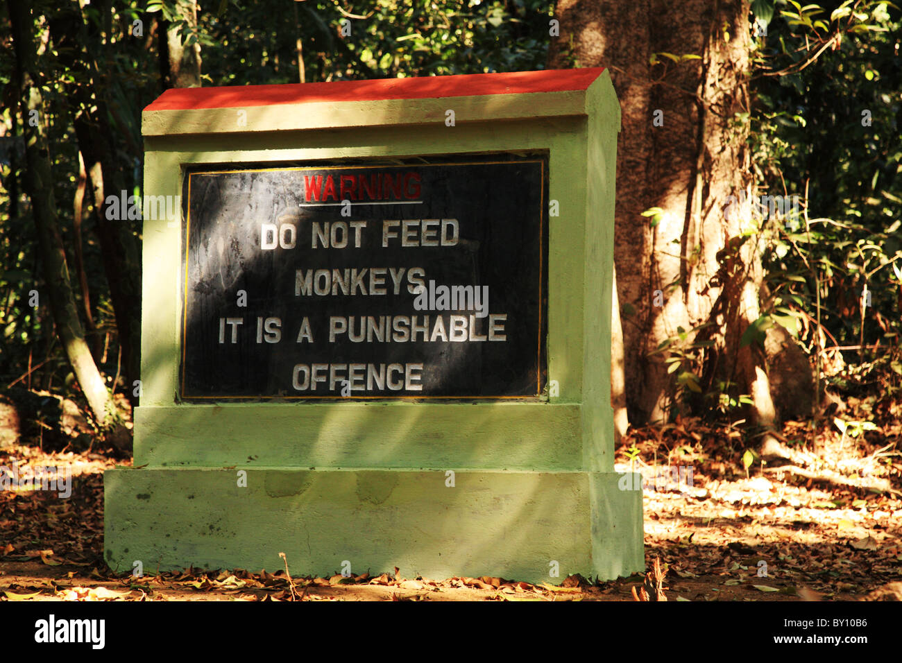 Warning do not feed the monkeys sign Dudhsagar falls Goa India Stock ...