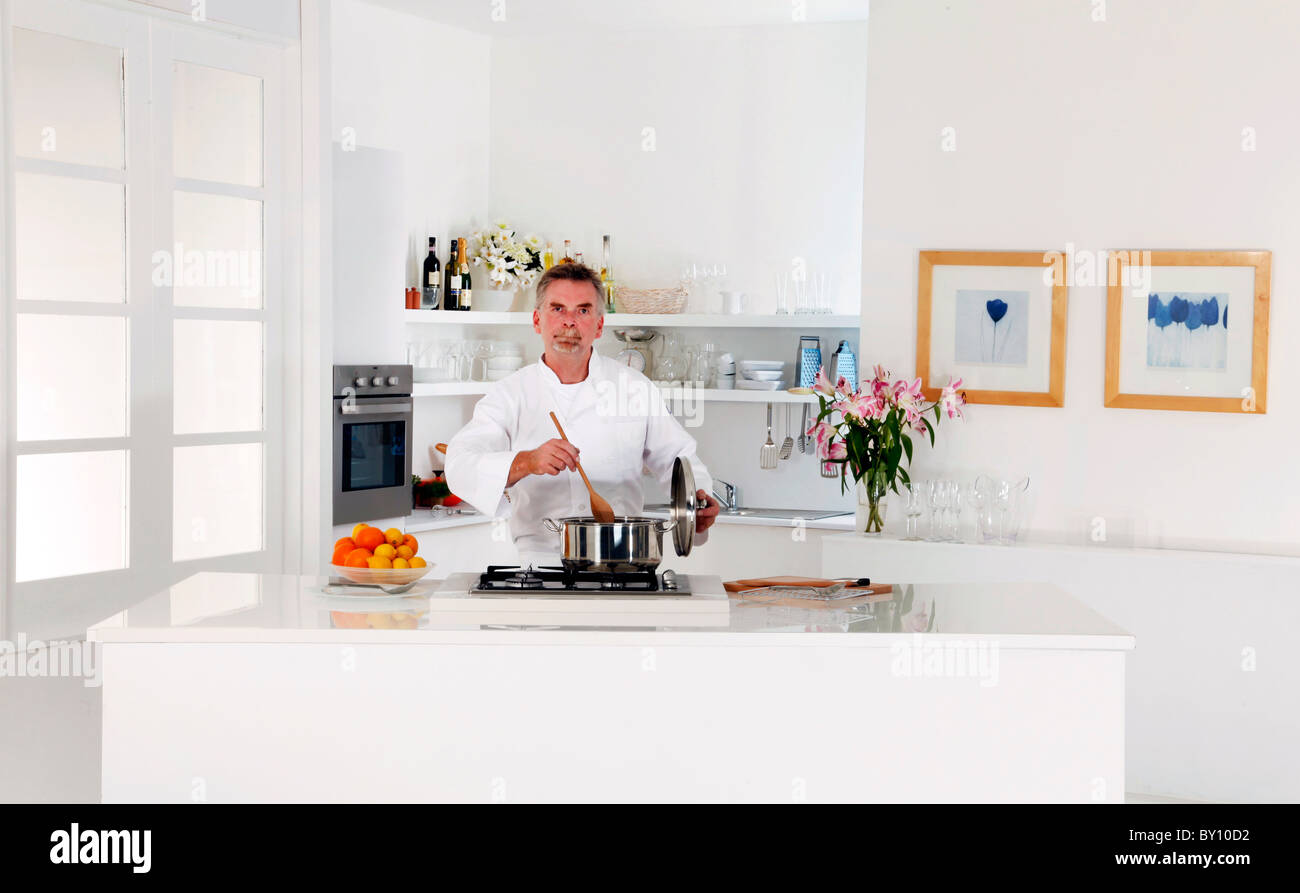 CHEF COOKING IN KITCHEN Stock Photo - Alamy