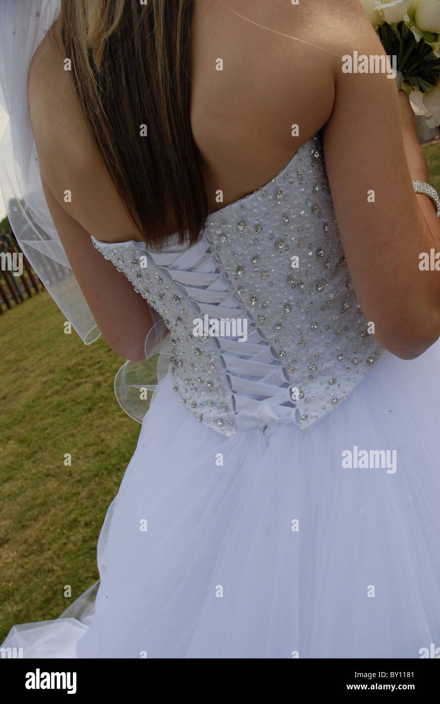 Rear / back view of a wedding a brides wedding dress detail Stock Photo ...