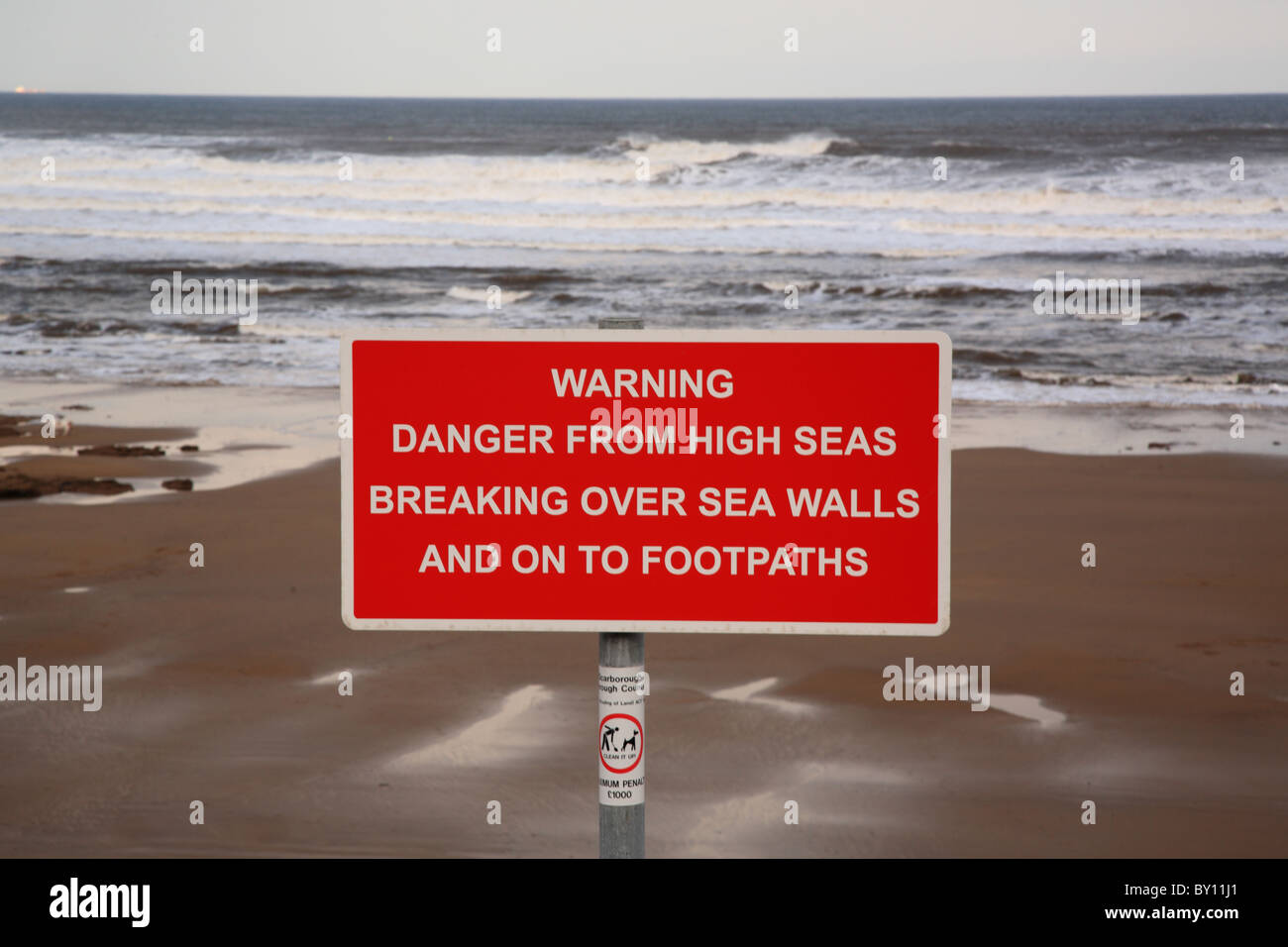 High Seas Warning Sign on the beach at Scarborough Stock Photo - Alamy