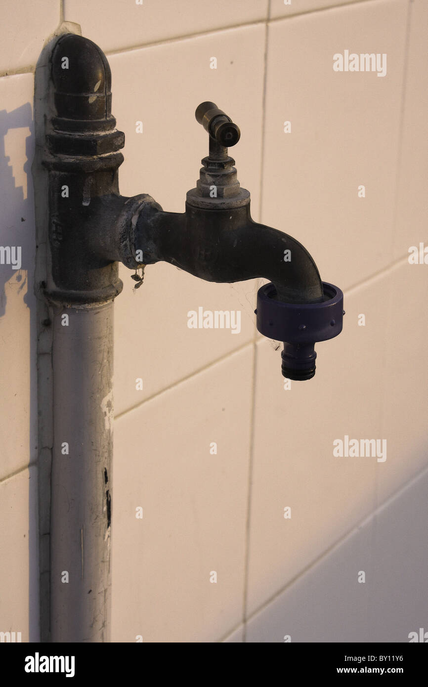 Water tap shadow wall hi-res stock photography and images - Alamy