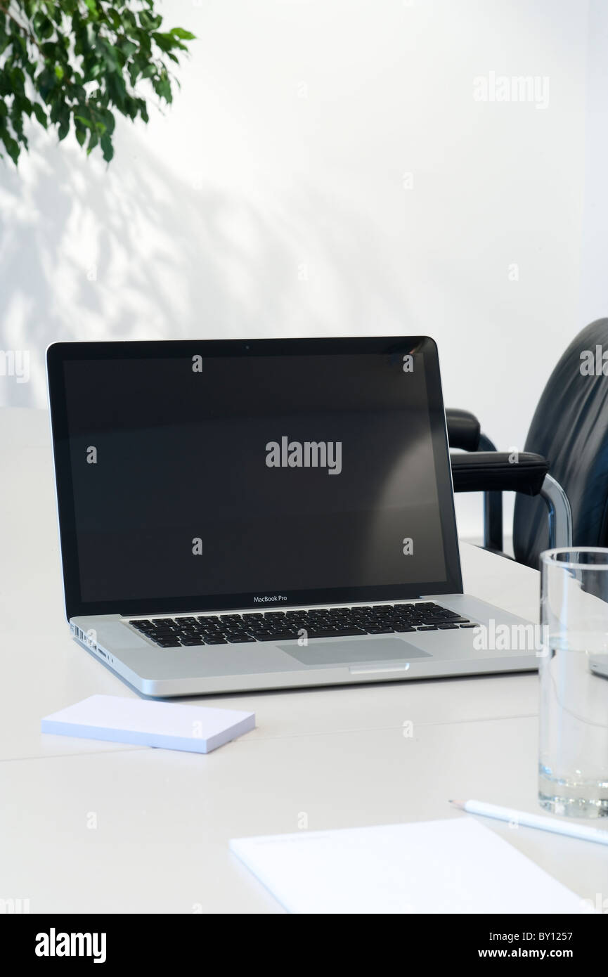 Apple Mac Book Pro in a modern office meeting room Stock Photo - Alamy