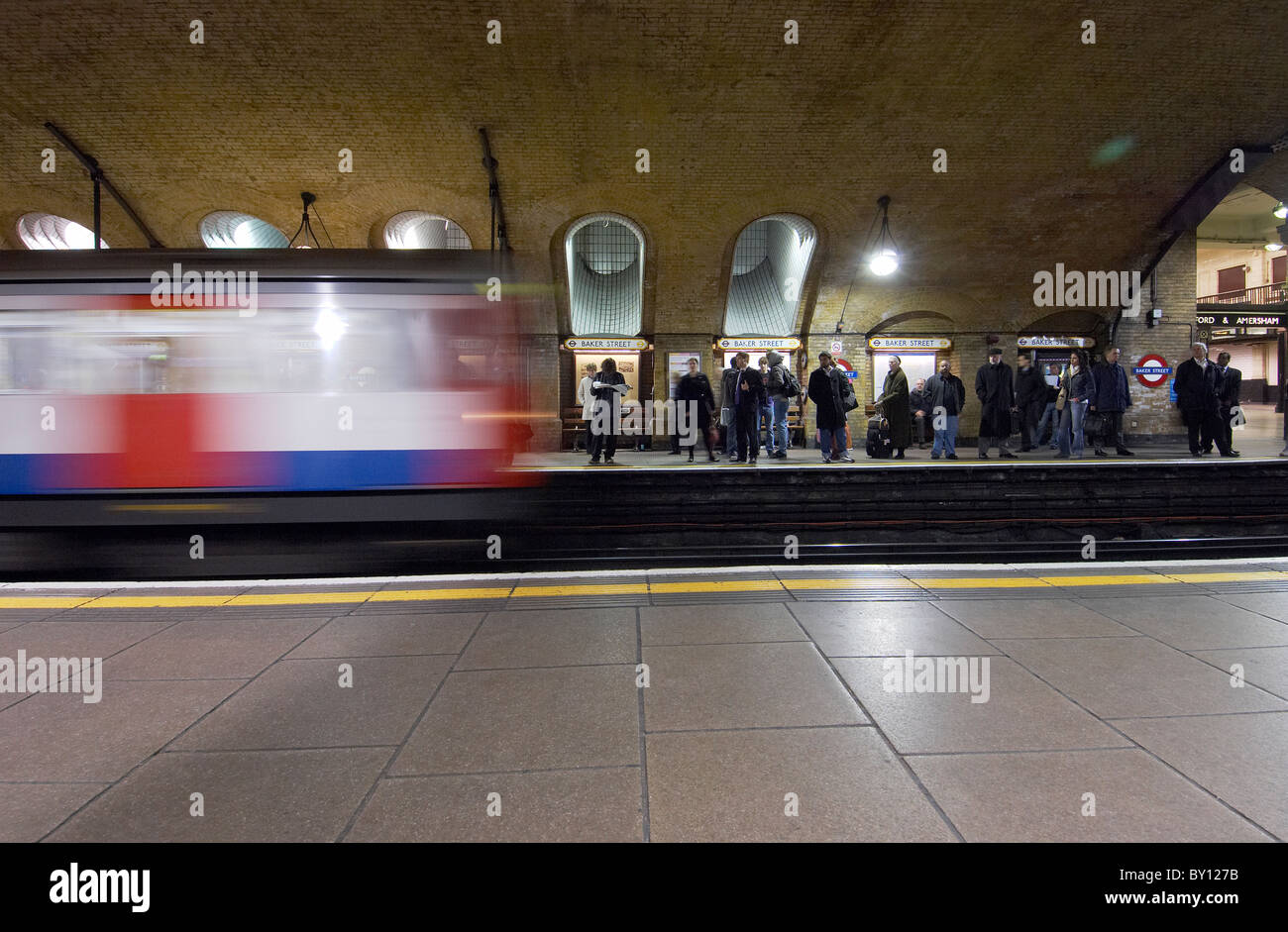 tube train pulling into leaving baker street tube Stock Photo - Alamy