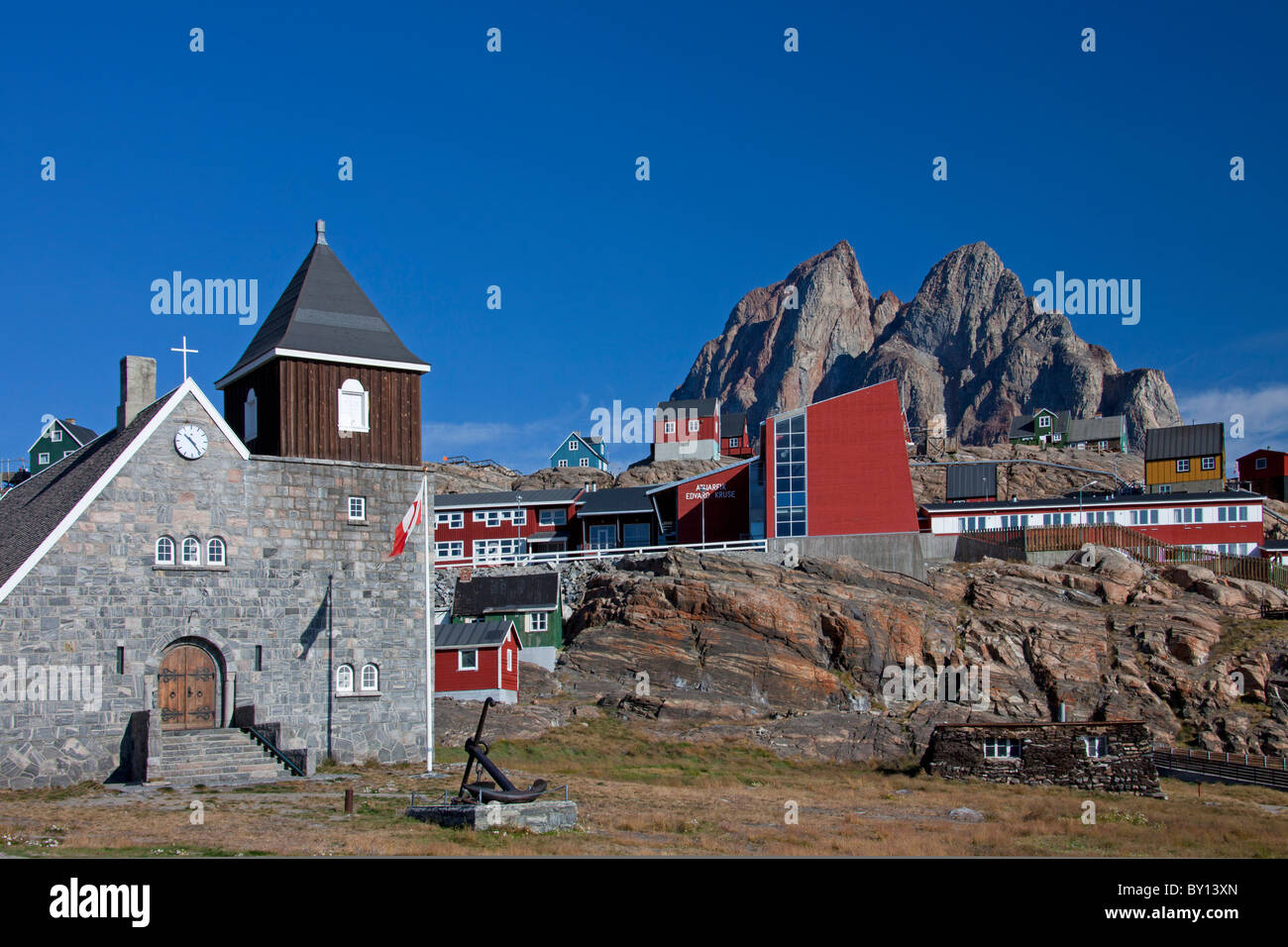 Uummannaq village with colourful houses and church in front of Heart ...