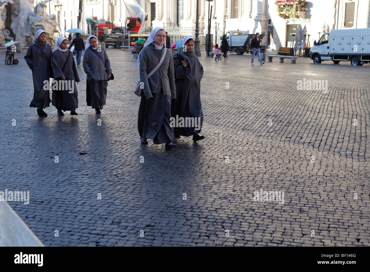 Group of nuns largely from Asian countries walking through Piazza ...