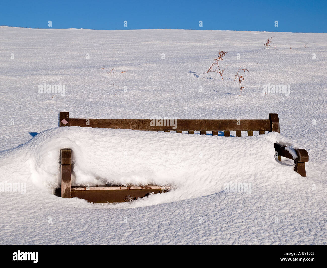 Snow covered seat after 24 inch (60 cm) snow fall at Goathland. North ...