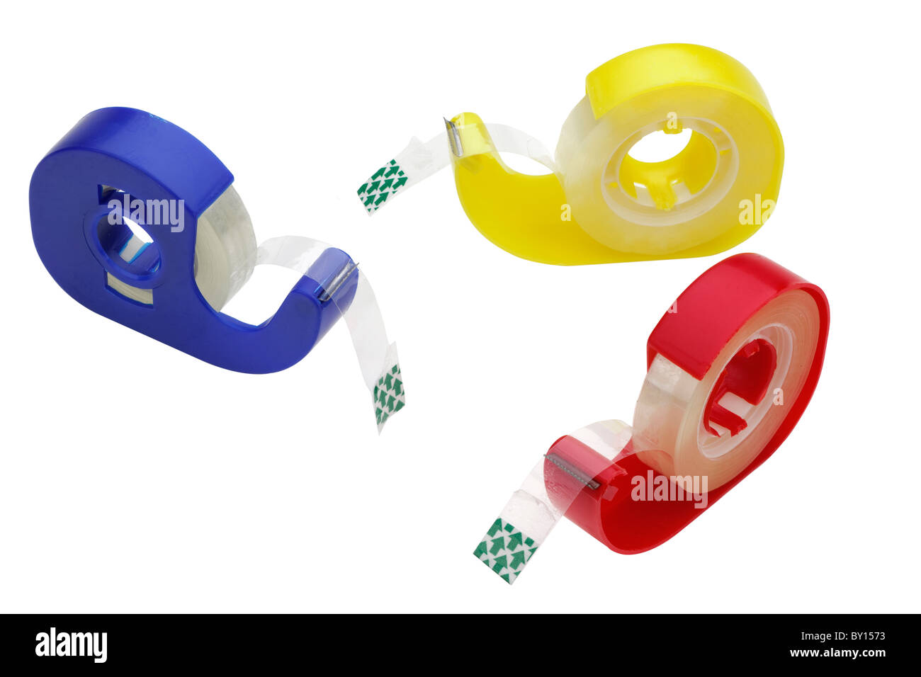 Three mixed coloured plastic sticky tape dispensers Stock Photo - Alamy