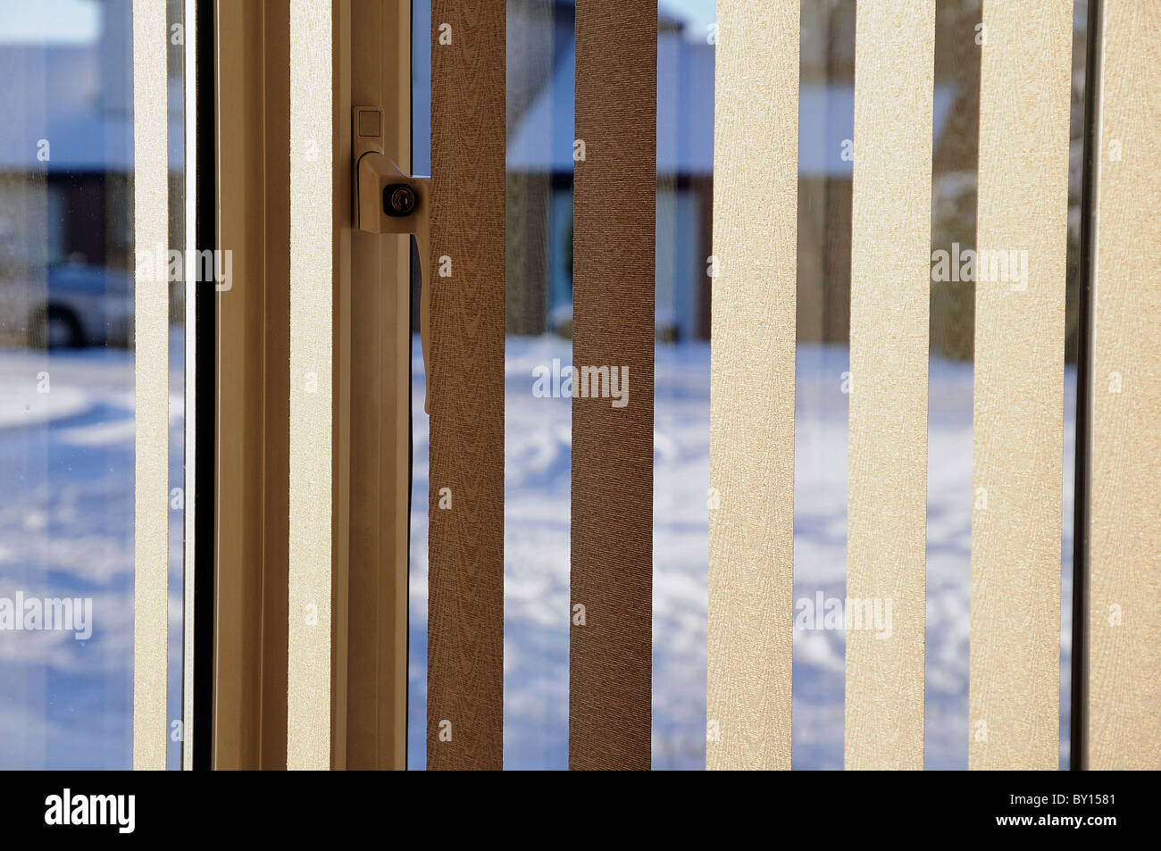 window blinds from inside view out of window of snow Stock Photo - Alamy