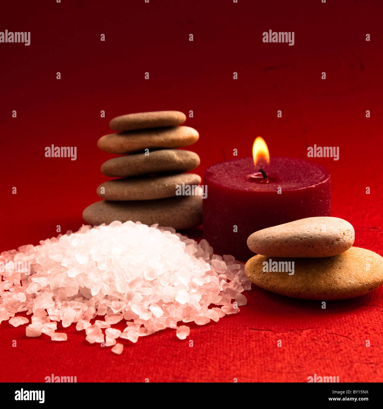 Red spa with salts and zen stones Stock Photo - Alamy