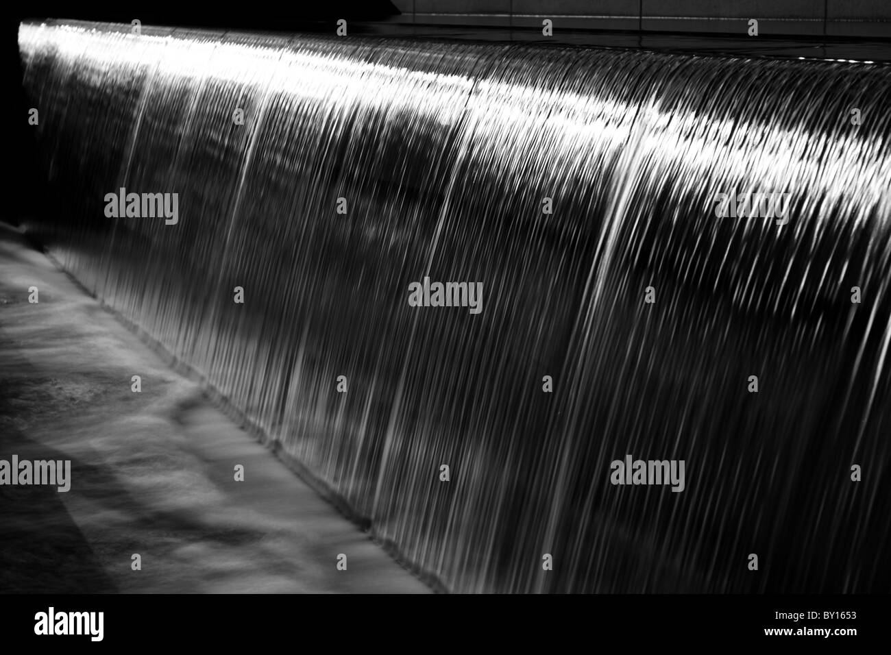 Water cascade as part of a water feature Stock Photo - Alamy