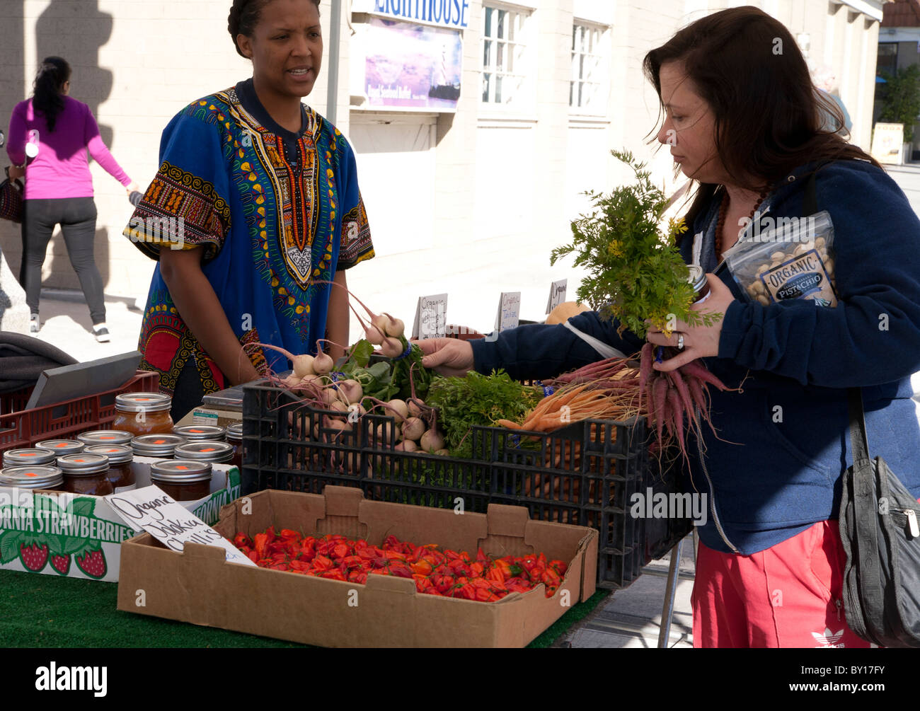 African woman selling tomatoes in hi-res stock photography and images ...