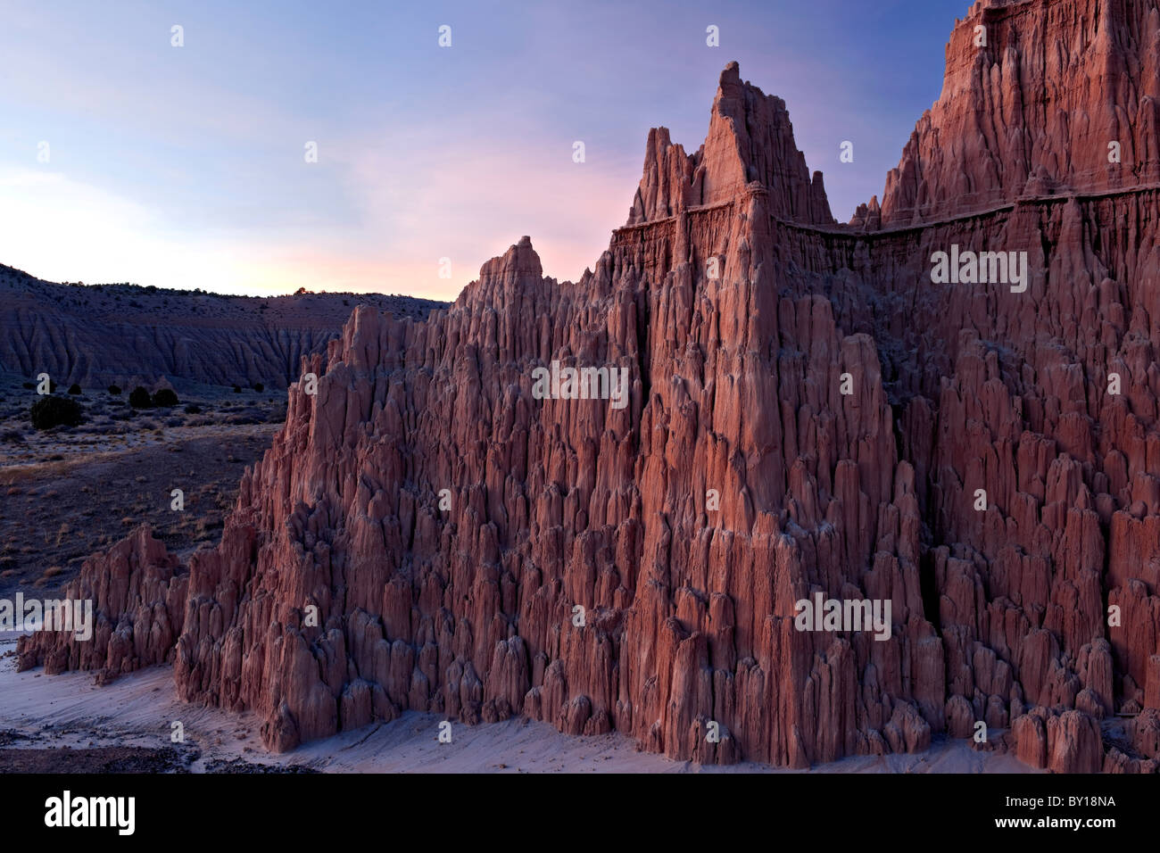 Sunset glow on the eroded clay spires in Nevada's Cathedral Gorge State ...
