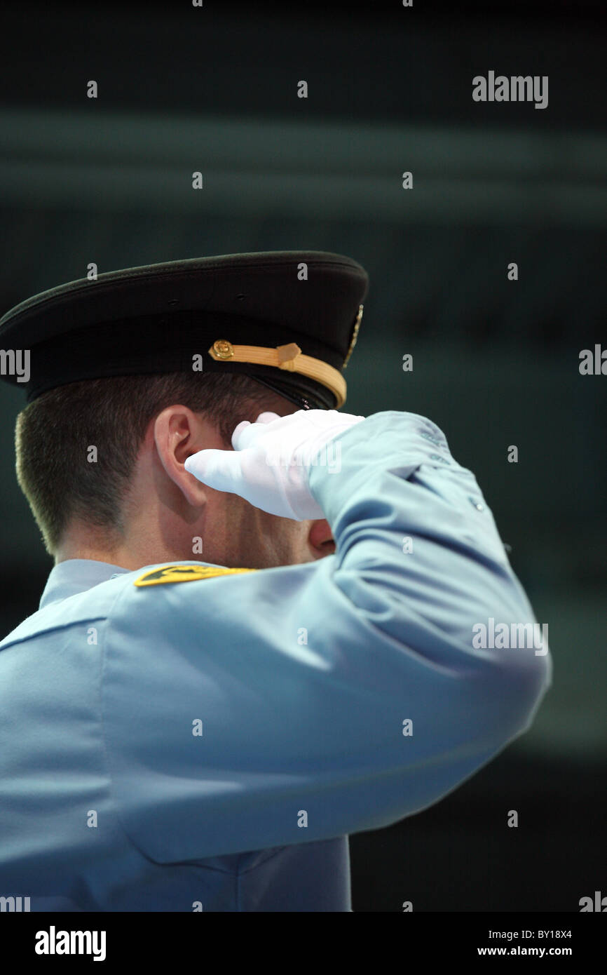 Young security guard saluting hi-res stock photography and images - Alamy