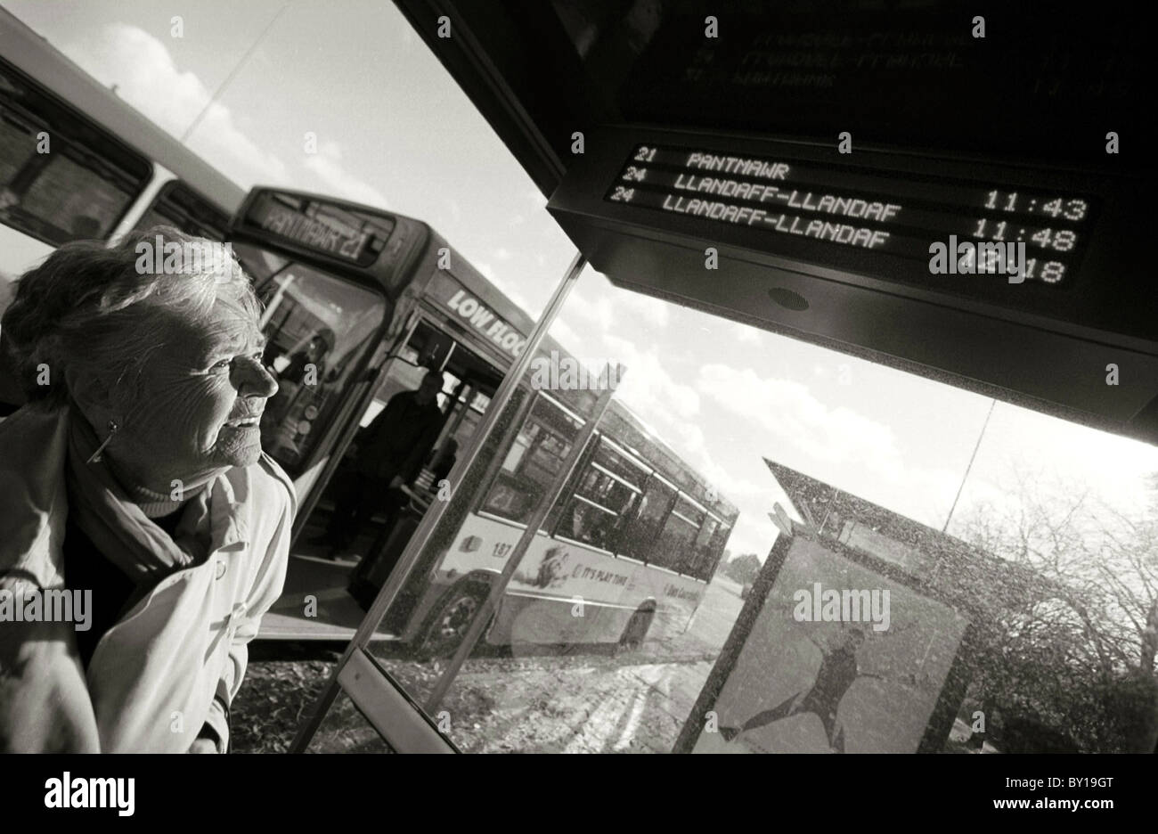An older lady waiting at the bus Stop, Cardiff Stock Photo - Alamy