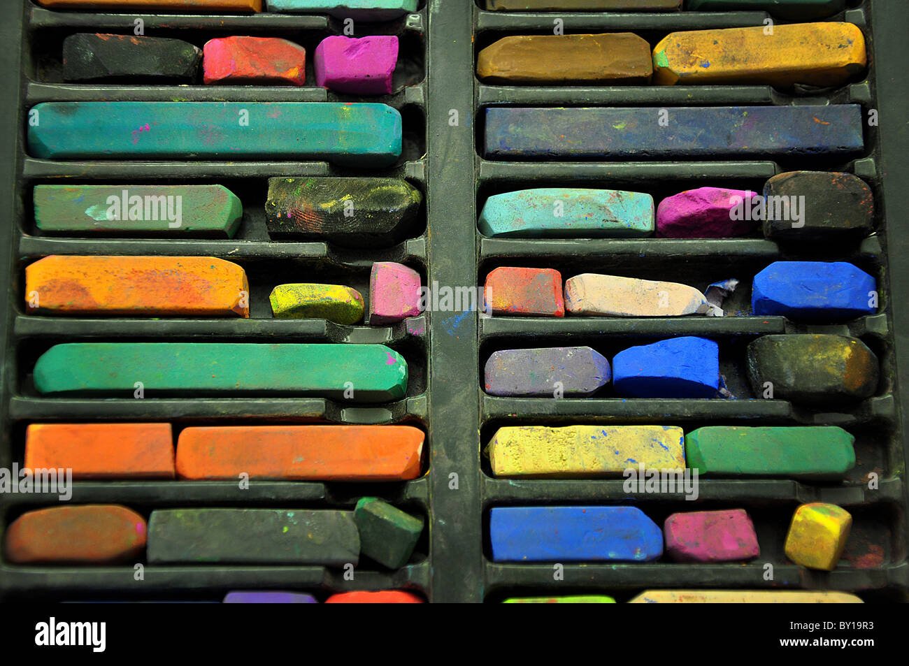 used pastels in a box Stock Photo - Alamy