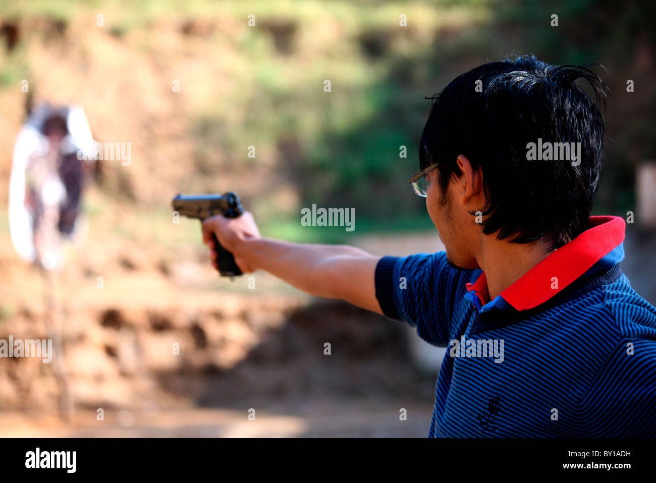 Target shooting boy hi-res stock photography and images - Alamy