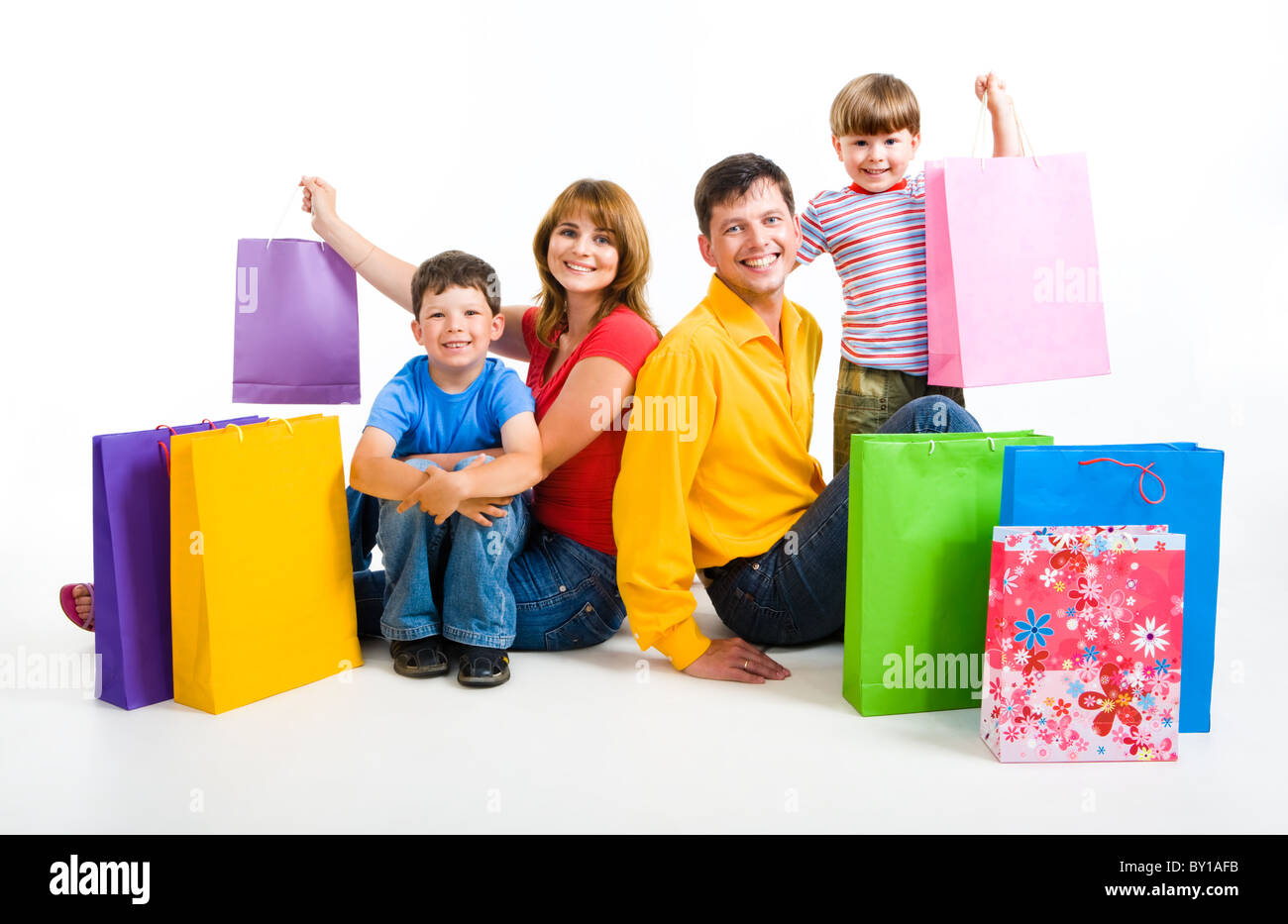 Parents children holding shopping bags hi-res stock photography and ...