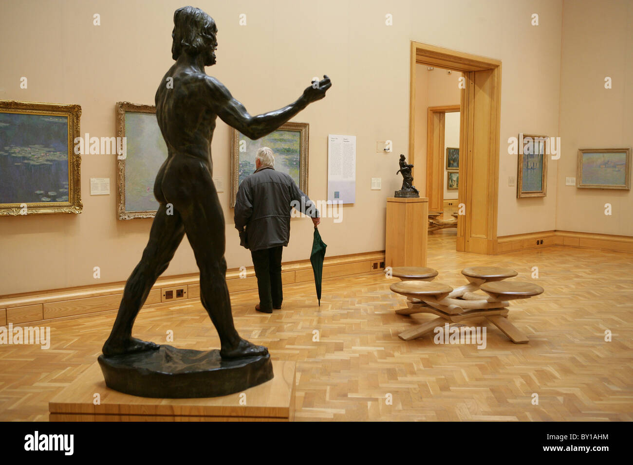 Viewing art at the National Museum Cardiff, Wales Stock Photo - Alamy