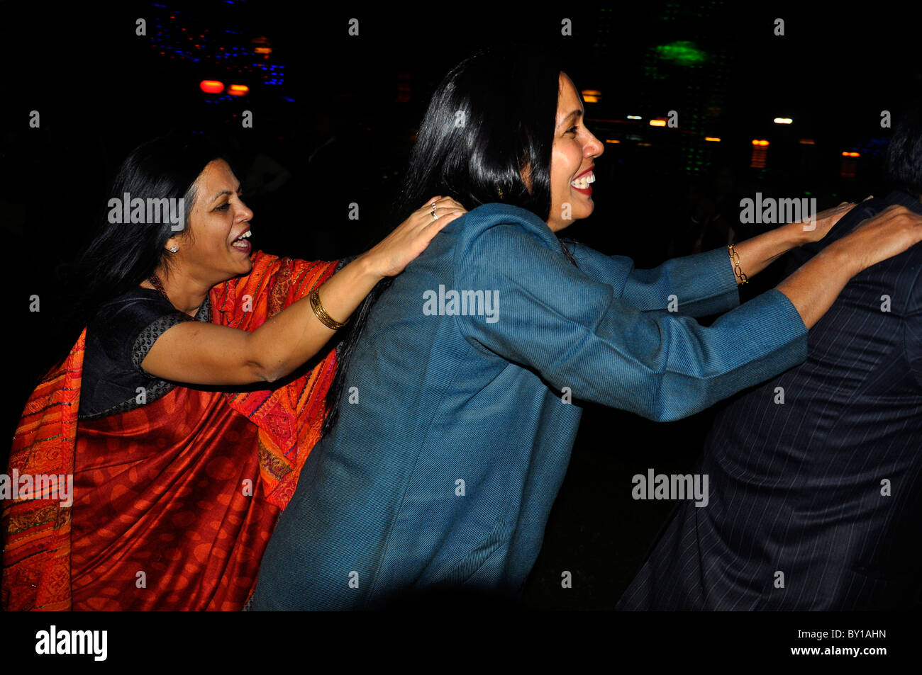 Indian women dancing in row Stock Photo - Alamy