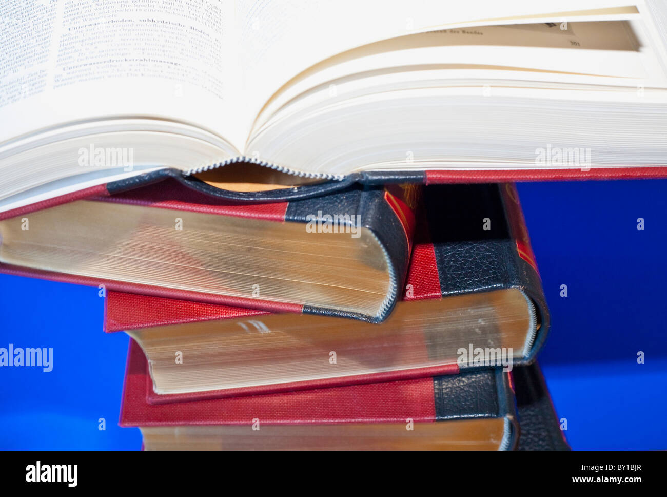 Pile of open books hi-res stock photography and images - Alamy