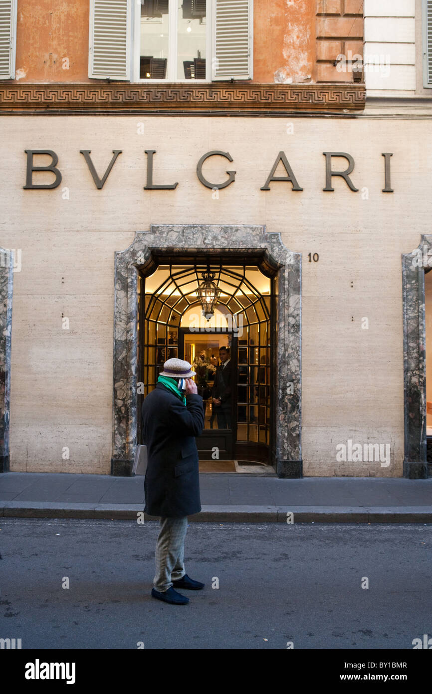 Bulgari store window one person communicate with a mobile phone via dei ...