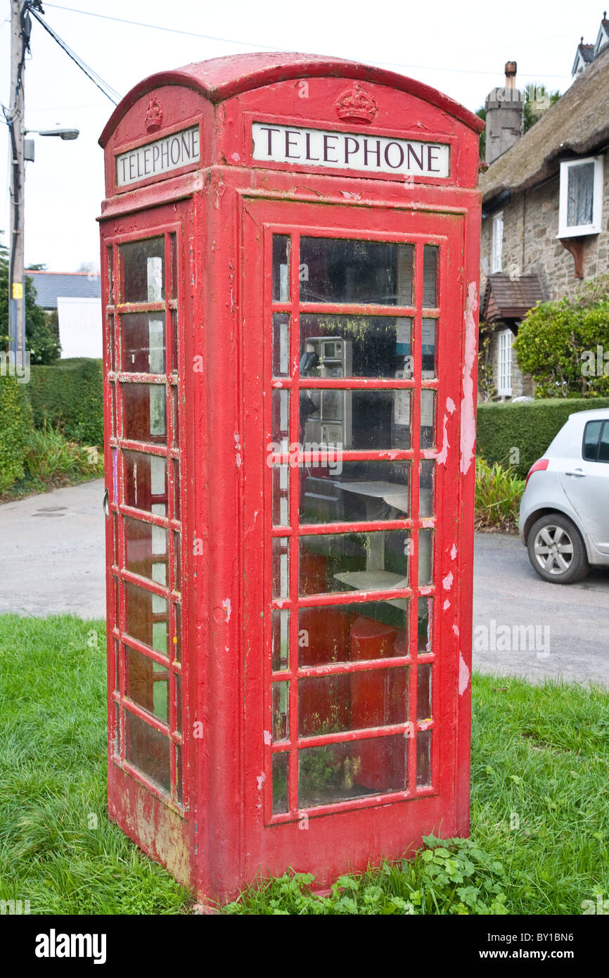 Old and neglected phone box Stock Photo - Alamy