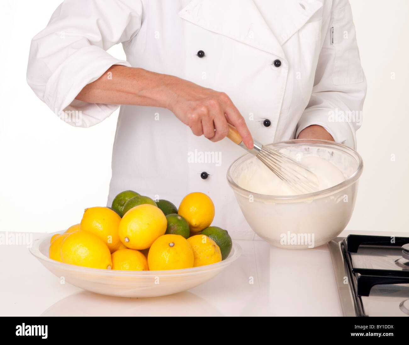 CHEF WHISKING EGG WHITES Stock Photo - Alamy